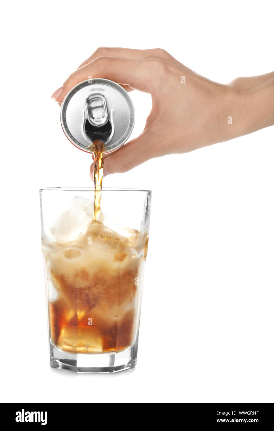 Woman pouring cola into glass on white background Stock Photo - Alamy