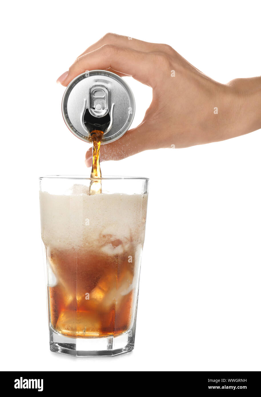 Woman pouring cola into glass on white background Stock Photo - Alamy