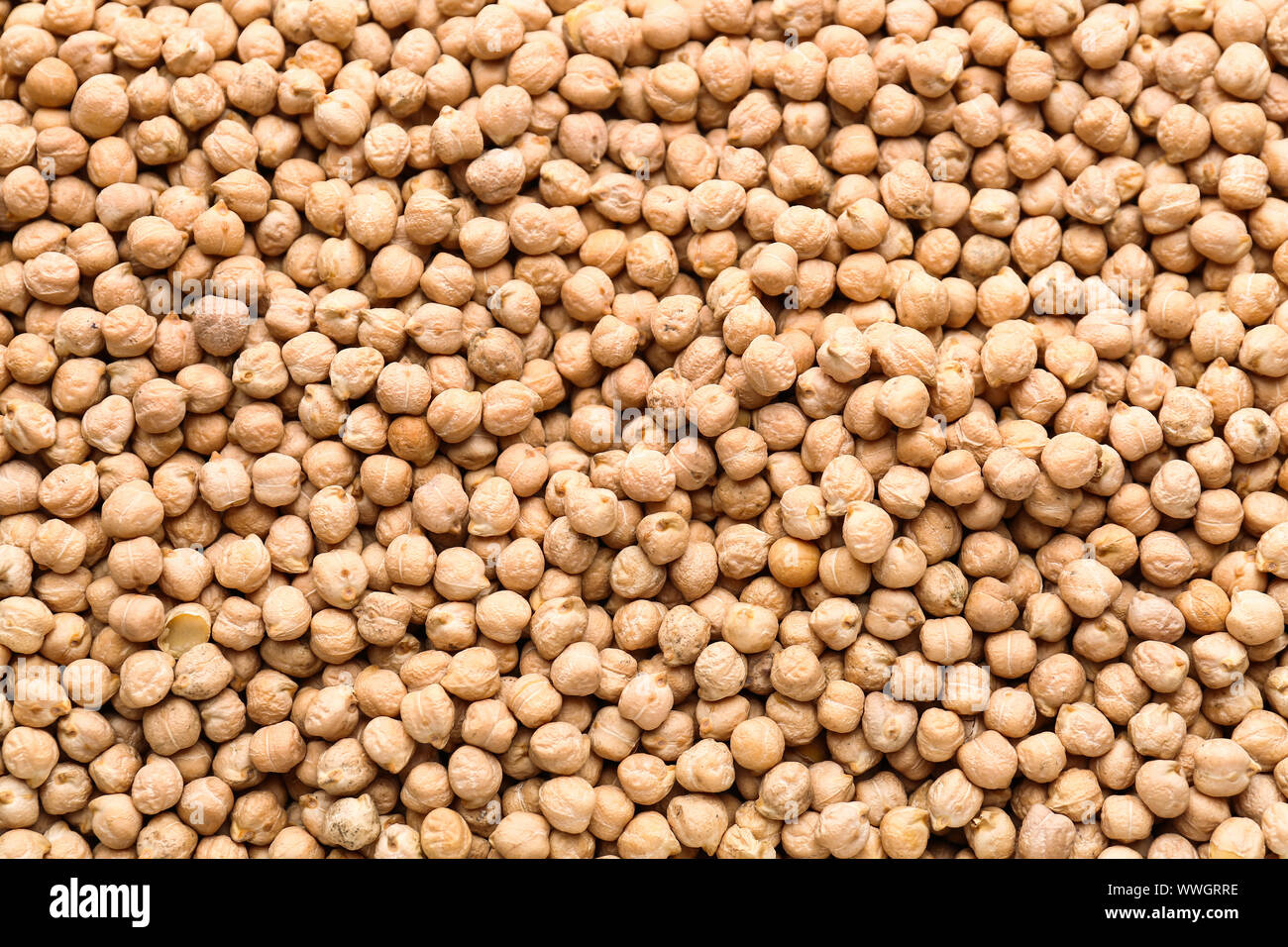 Many raw chickpea as background Stock Photo - Alamy