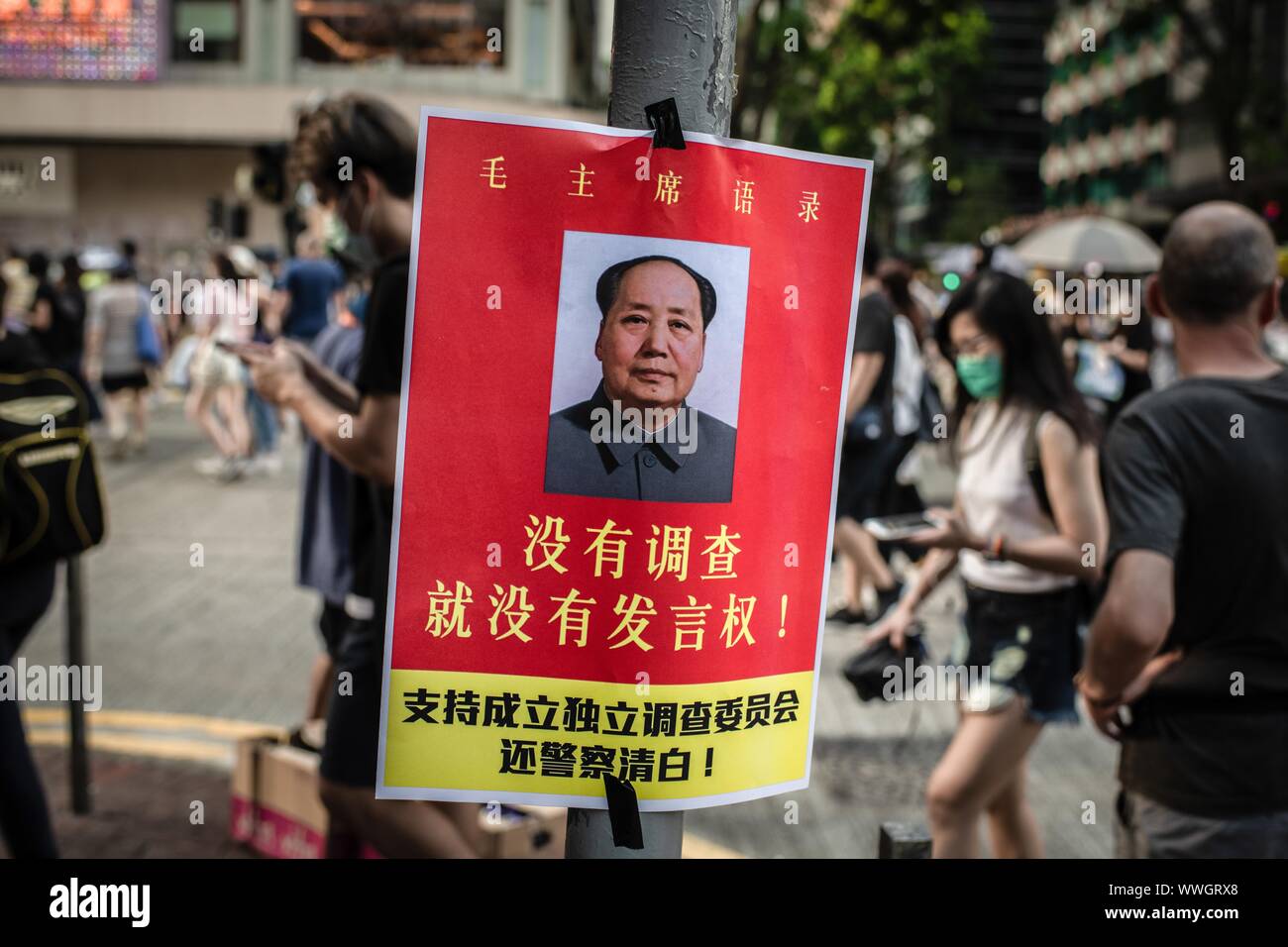 Hong Kong. 15th Sep, 2019. A placard with a picture of Mao Zedong hangs ...