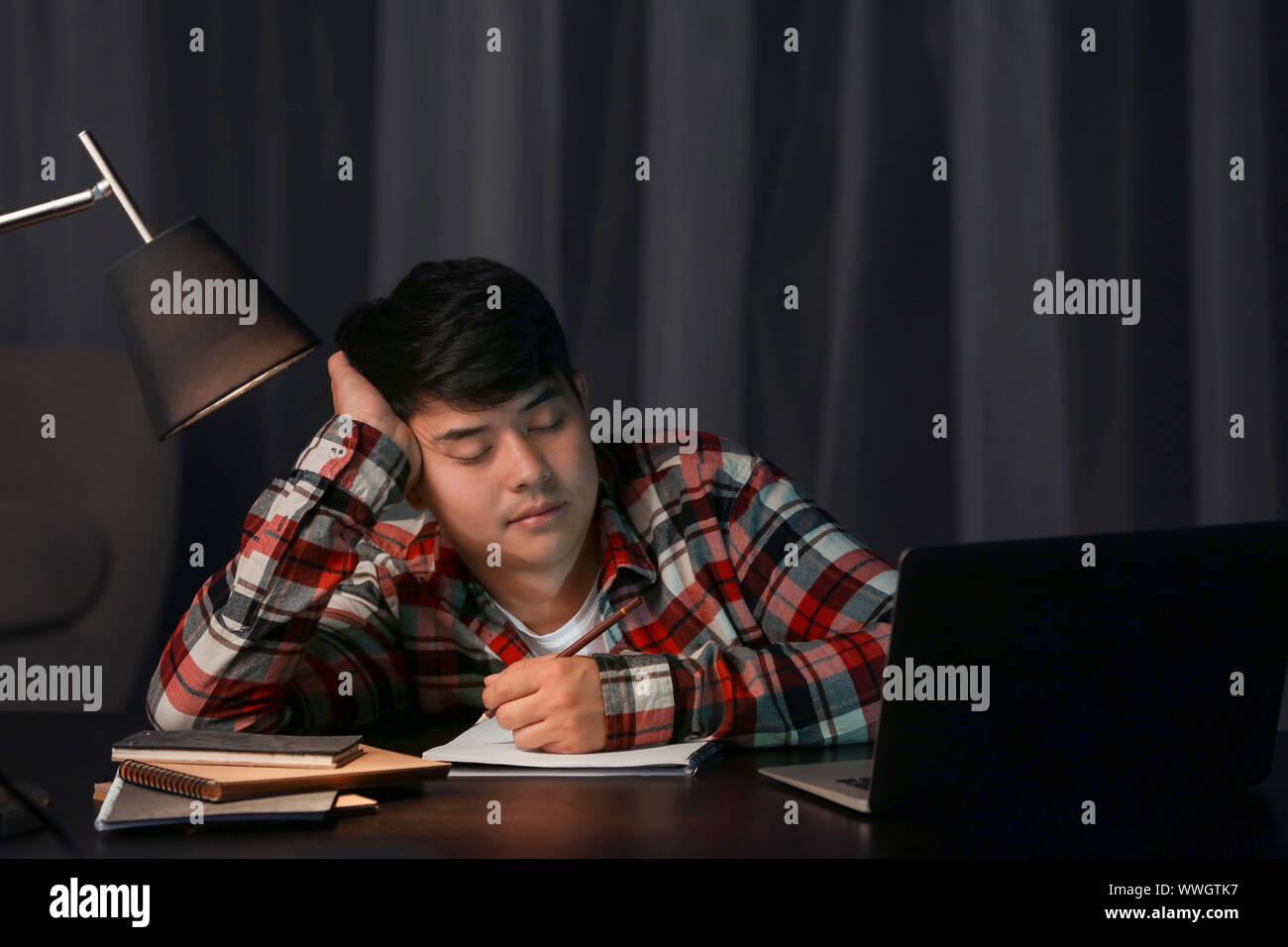 Sleepy student writing hi-res stock photography and images - Alamy