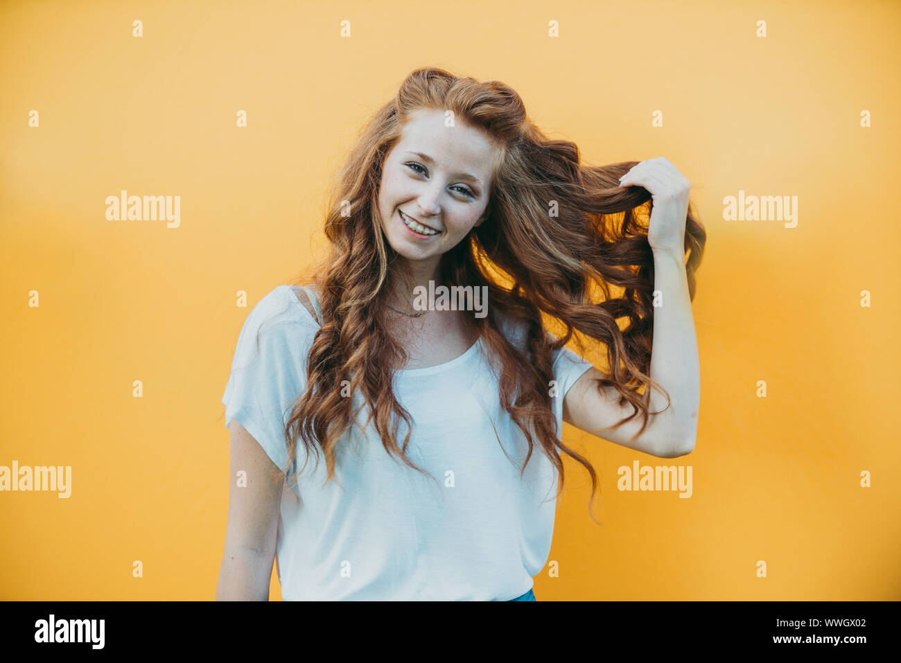 Beautiful teen portraits on colored background Stock Photo - Alamy