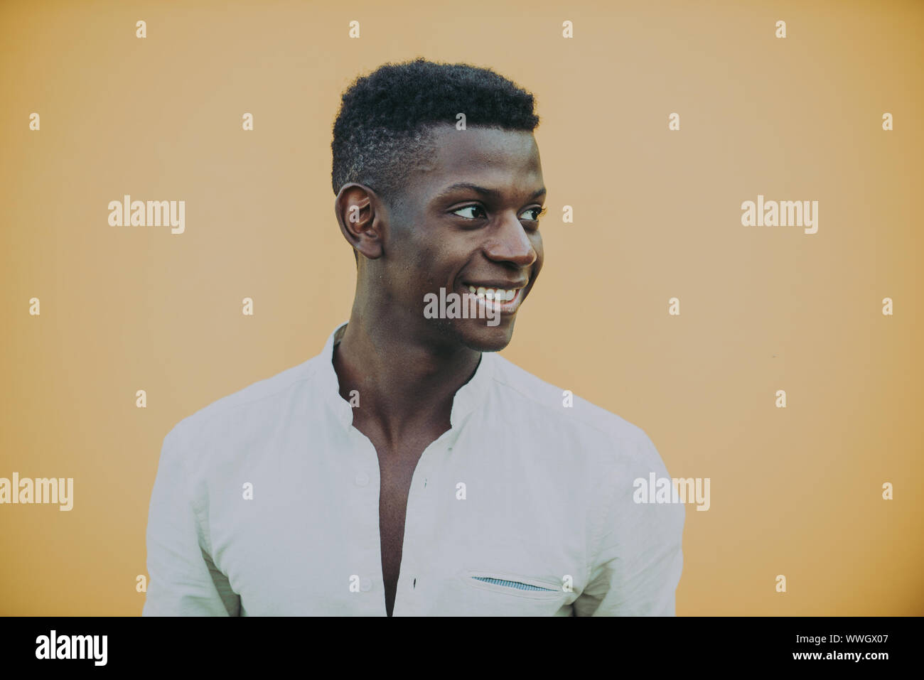 Beautiful teenager boy portraits on colored backgrounds Stock Photo - Alamy