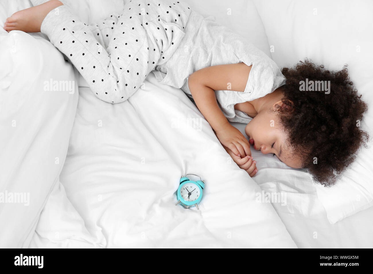African child alarm clock hi-res stock photography and images - Alamy