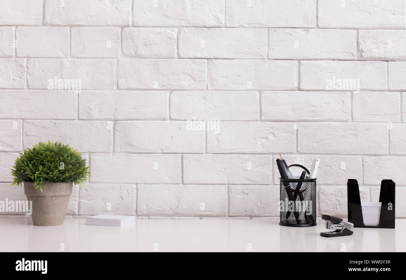Create your modern office table with green plant and supplies Stock ...