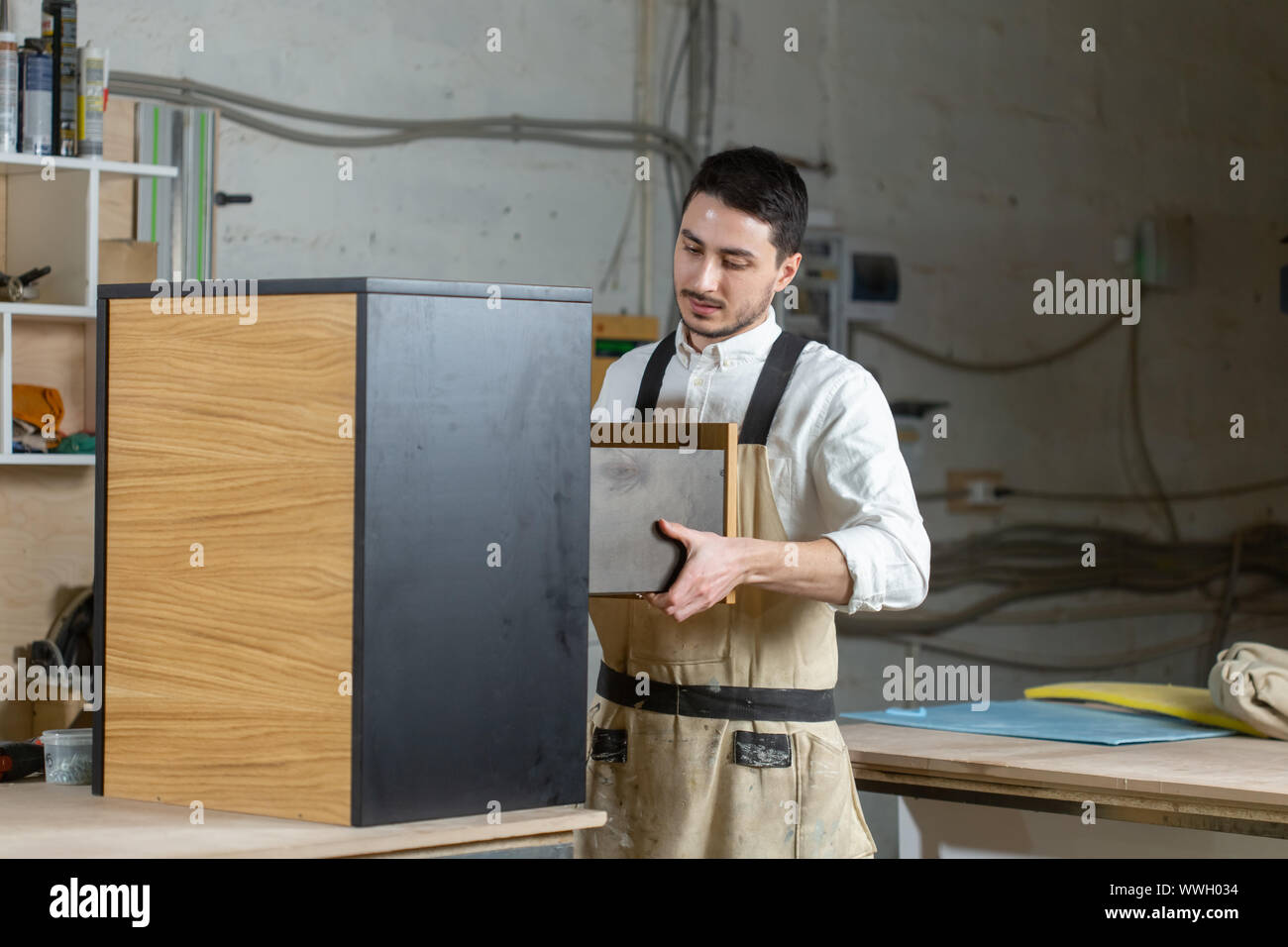 Furniture factory and small and medium sized enterprises concept - Man ...