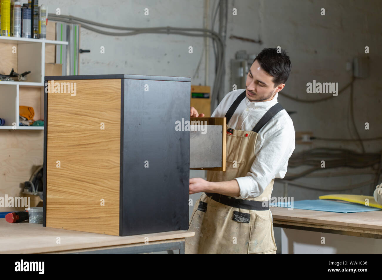 Furniture factory and small and medium sized enterprises concept - Man ...