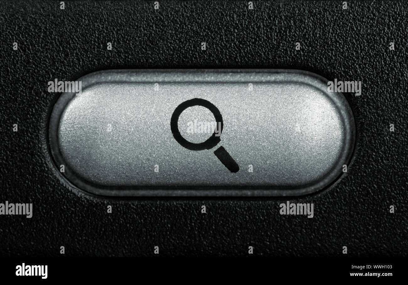 computer key with magnifying symbol Stock Photo - Alamy