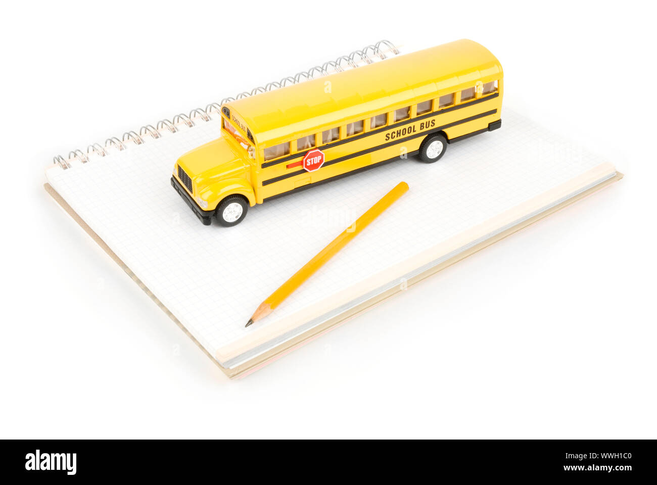 school bus and notebook with pen isolated on white background Stock ...