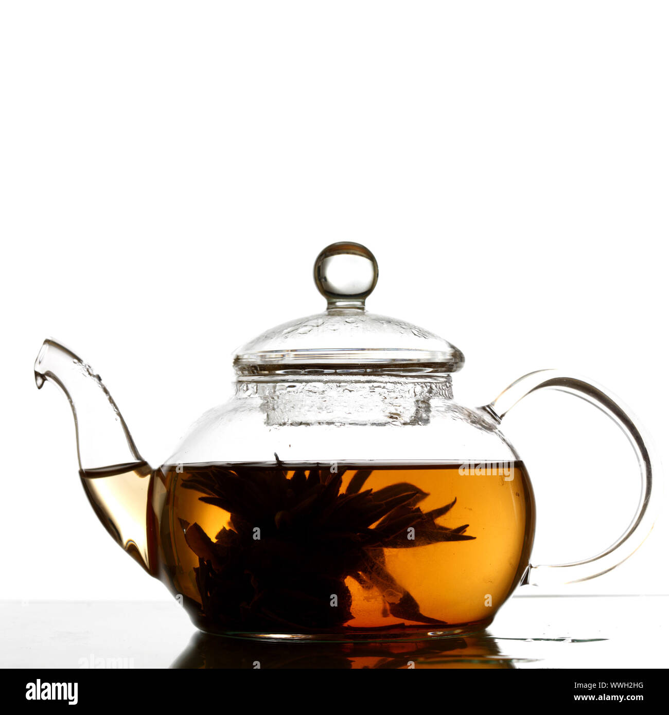 tea in glass pot isolated Stock Photo - Alamy