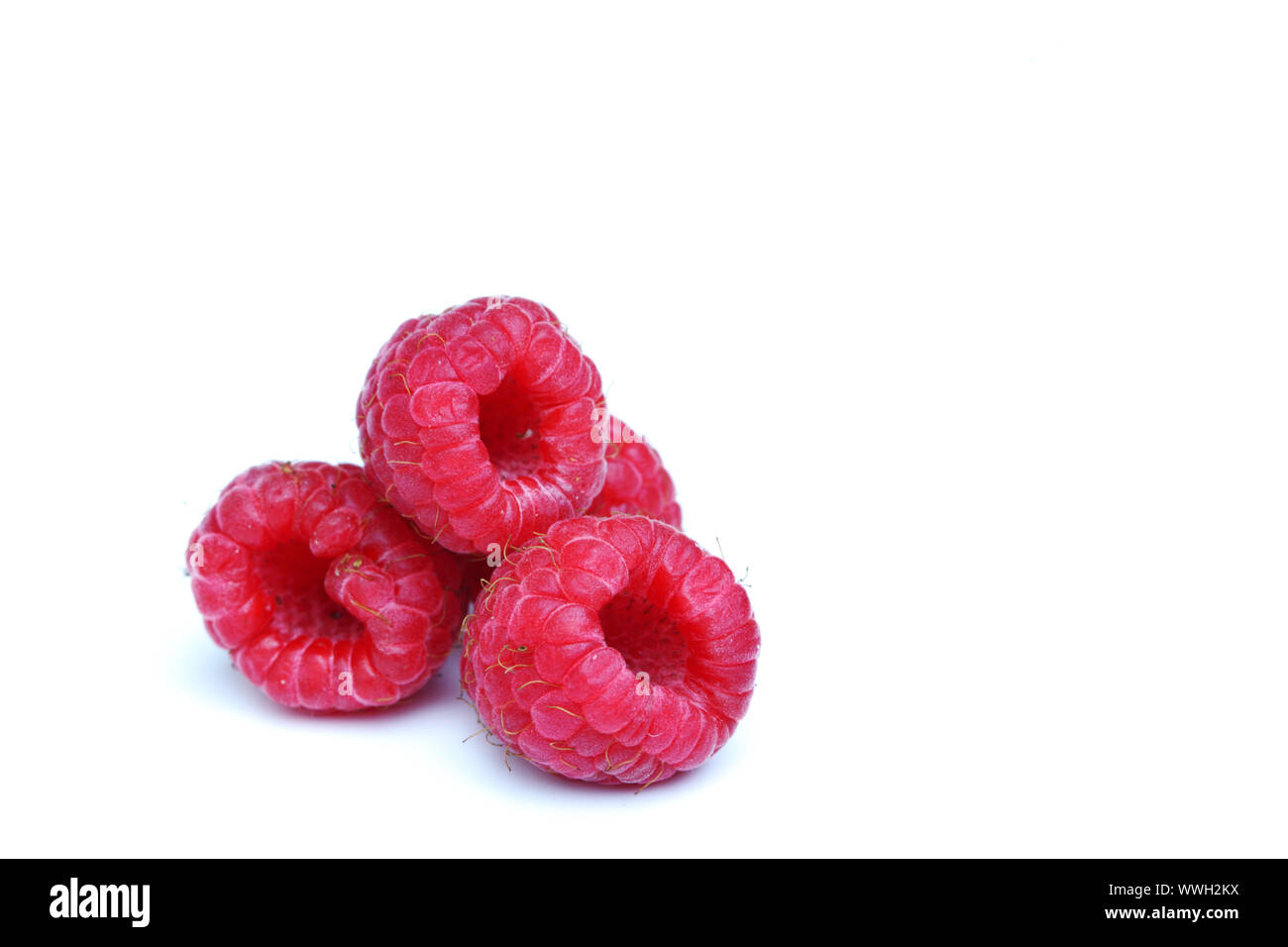 raspberry pile isolated on white Stock Photo - Alamy