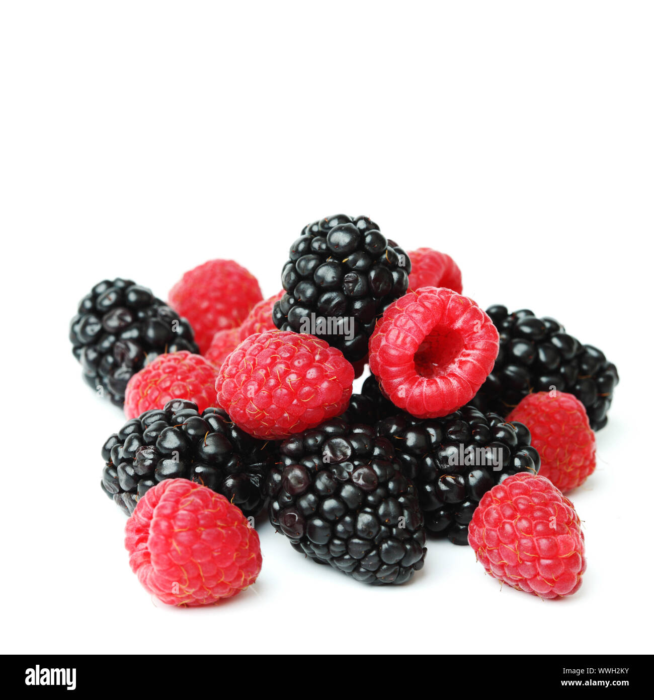 berry mixed pile on black background Stock Photo - Alamy