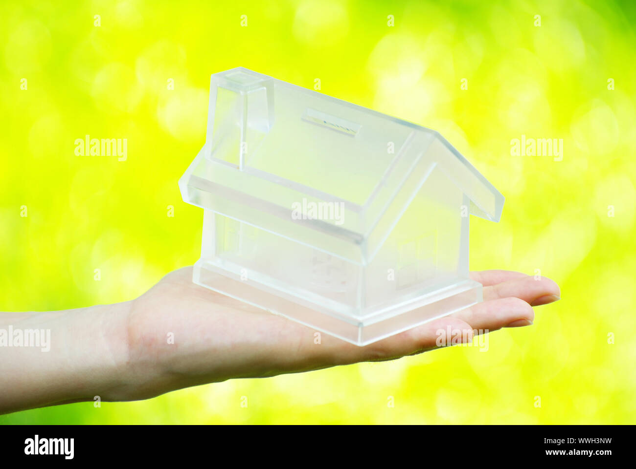 The house in human hand Stock Photo - Alamy
