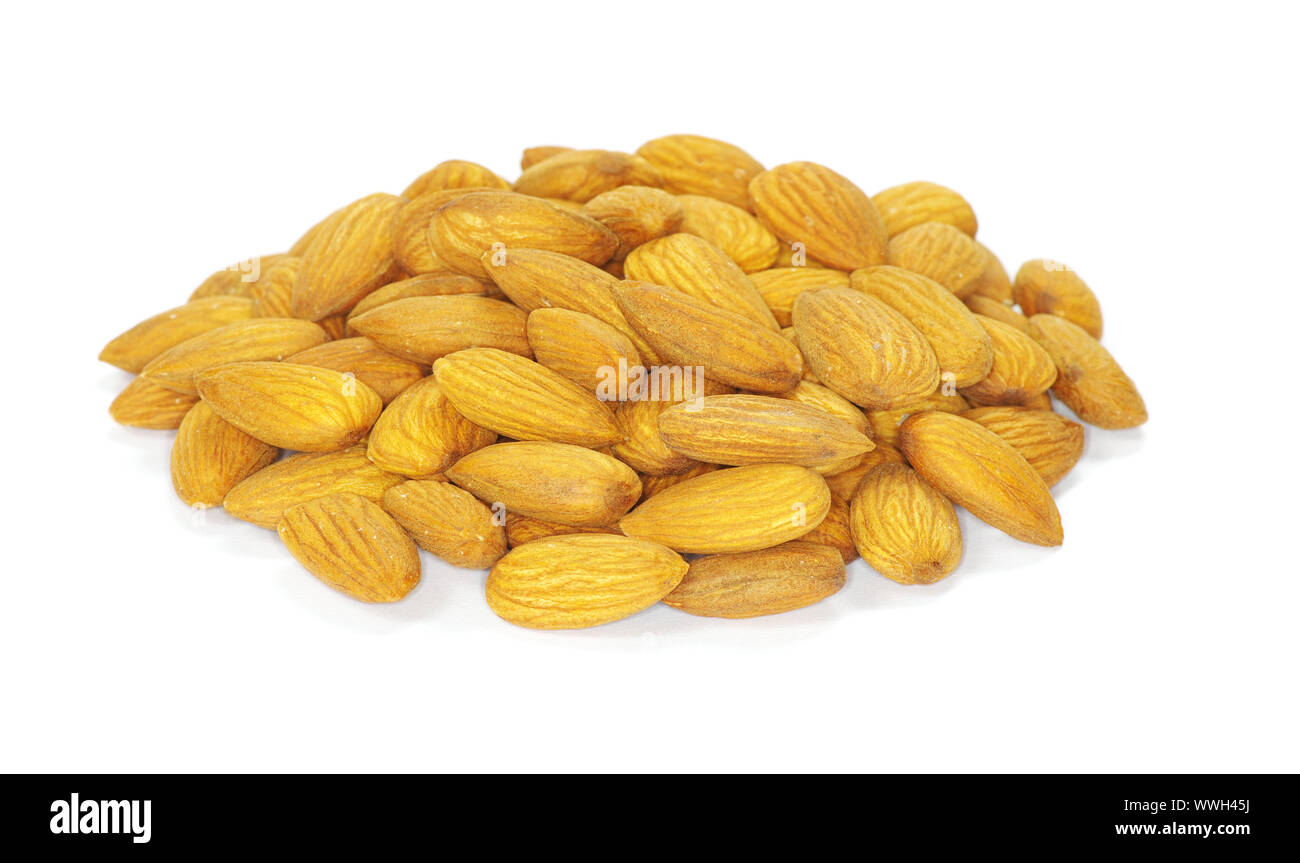 Pile of almonds in isolated white background Stock Photo - Alamy