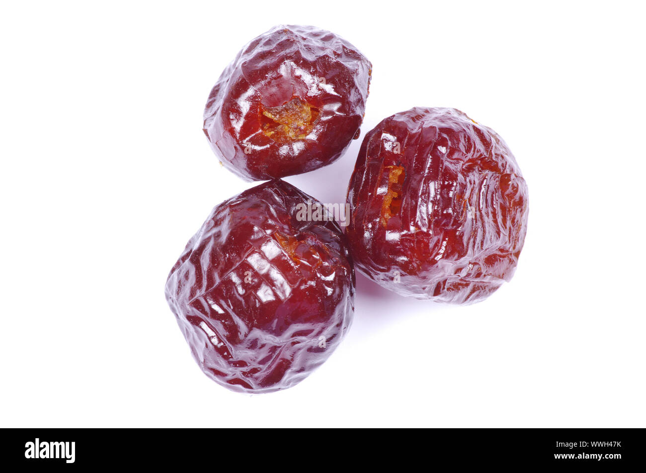dryed dates on white background Stock Photo - Alamy