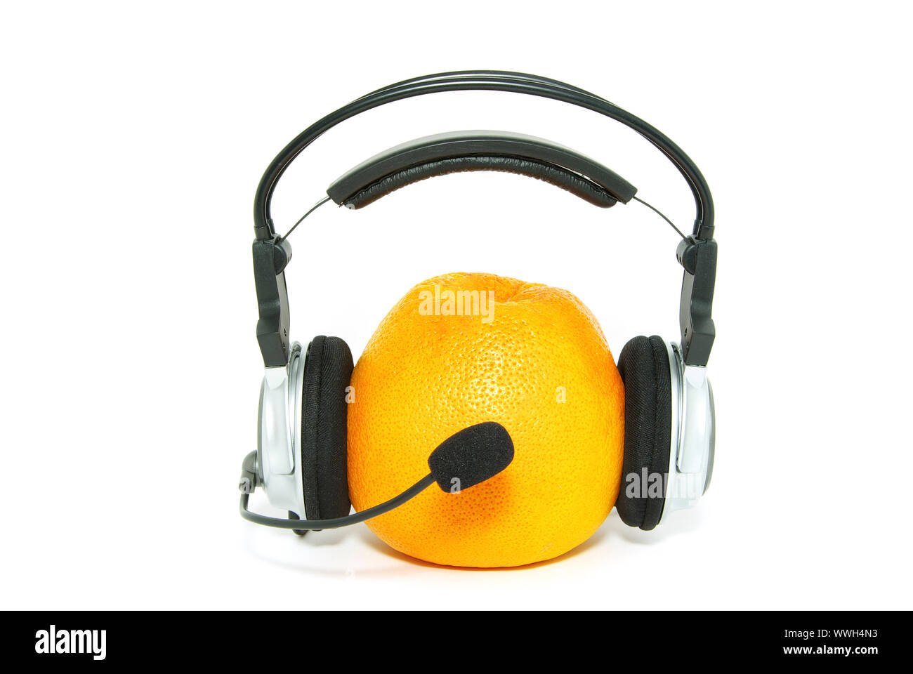 orange and headphones isolated on a white Stock Photo - Alamy