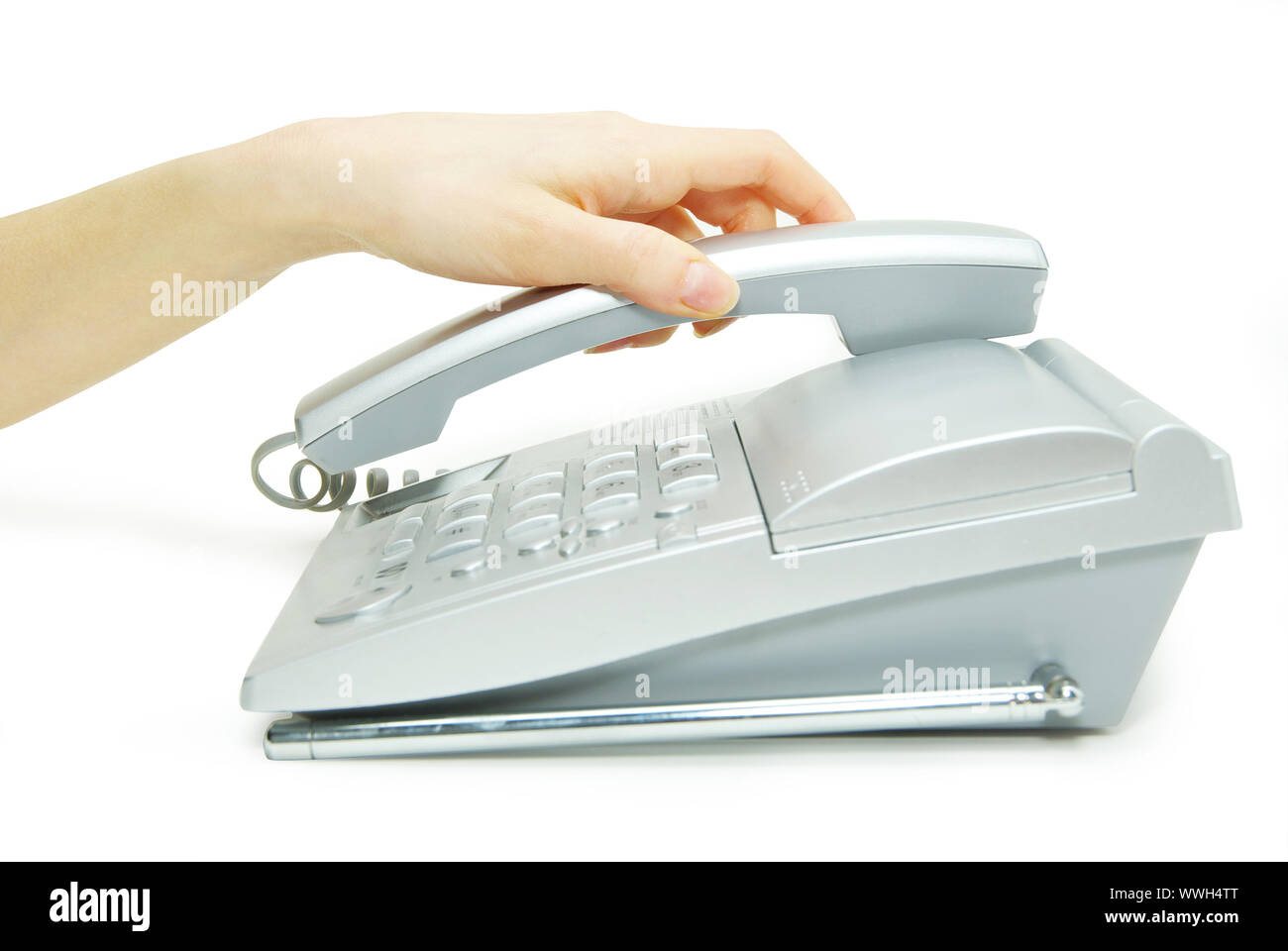 finger with grey telephone keypad on white Stock Photo - Alamy