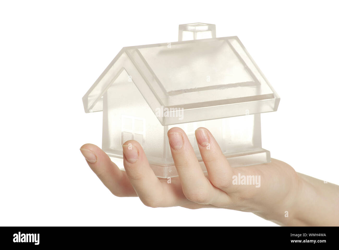 The home in human hand on white Stock Photo - Alamy