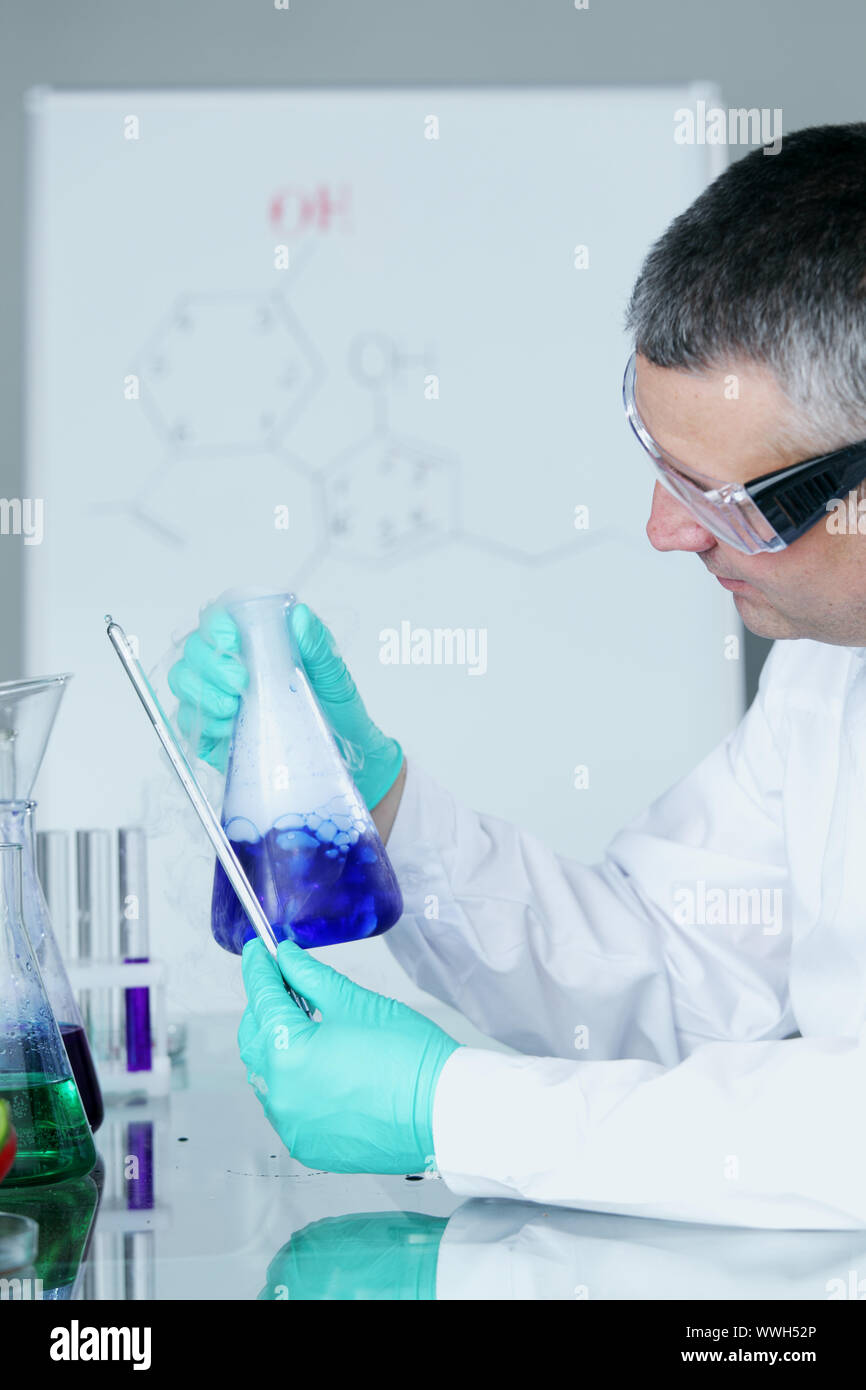 Chemistry Scientist conducting experiments in laboratory Stock Photo ...