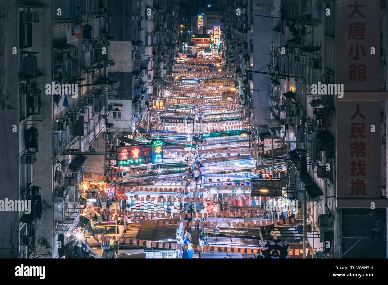 Temple street at night in Hong Kong. Temple Street is the most famous ...