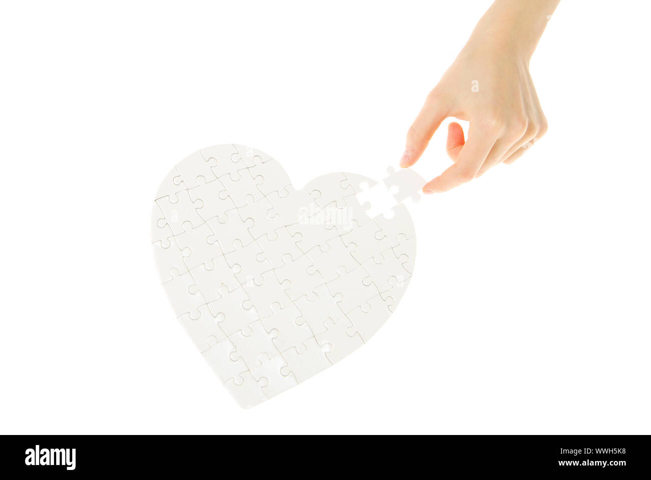 puzzle heart isolated on a white background Stock Photo - Alamy