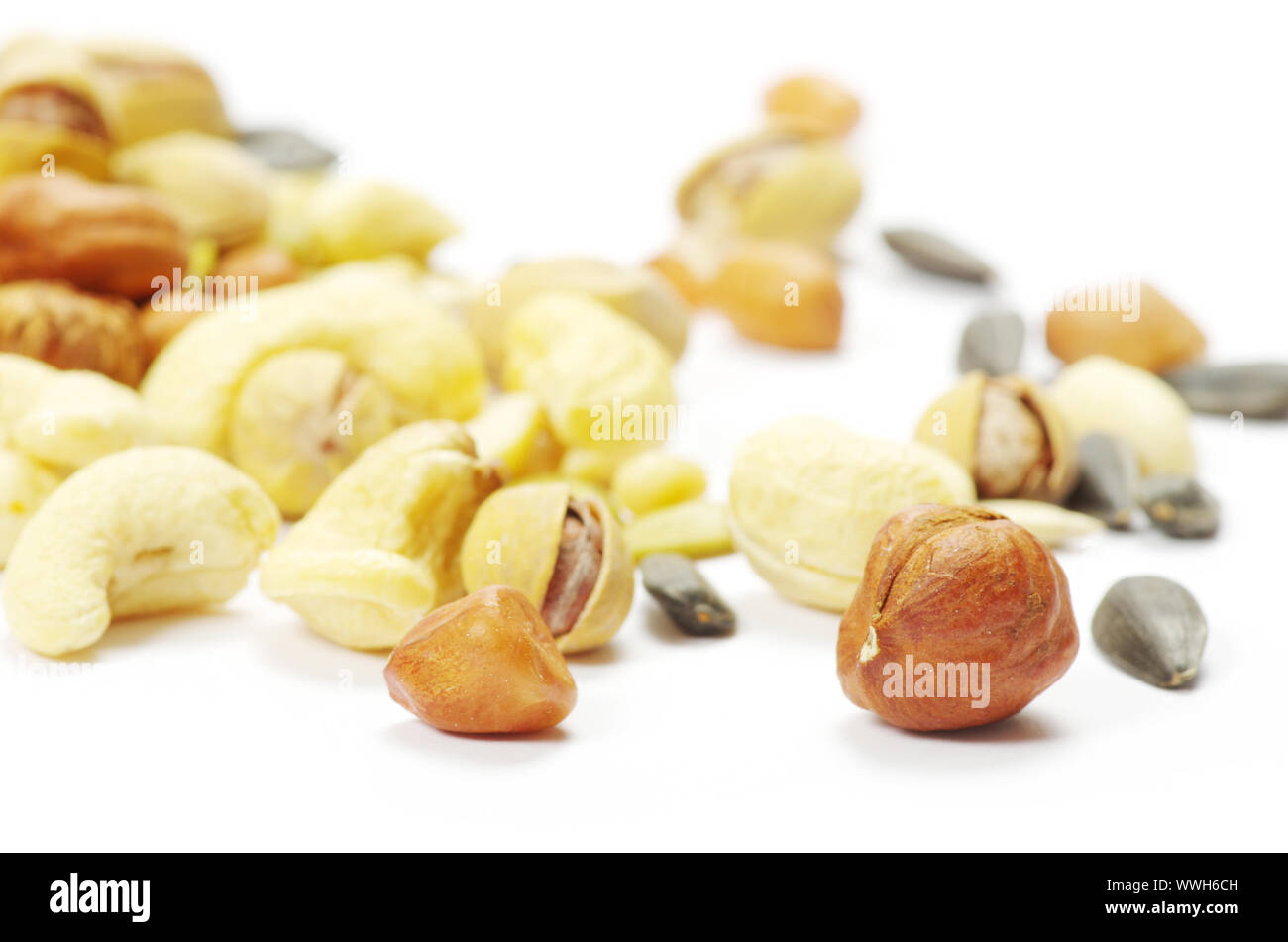 Assorted mixed nuts on white background Stock Photo - Alamy