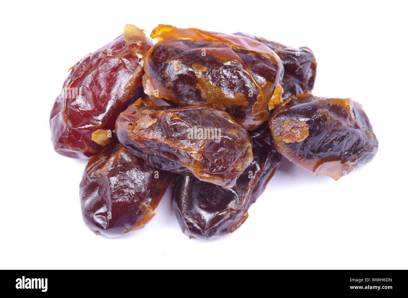 dryed dates on white background Stock Photo - Alamy