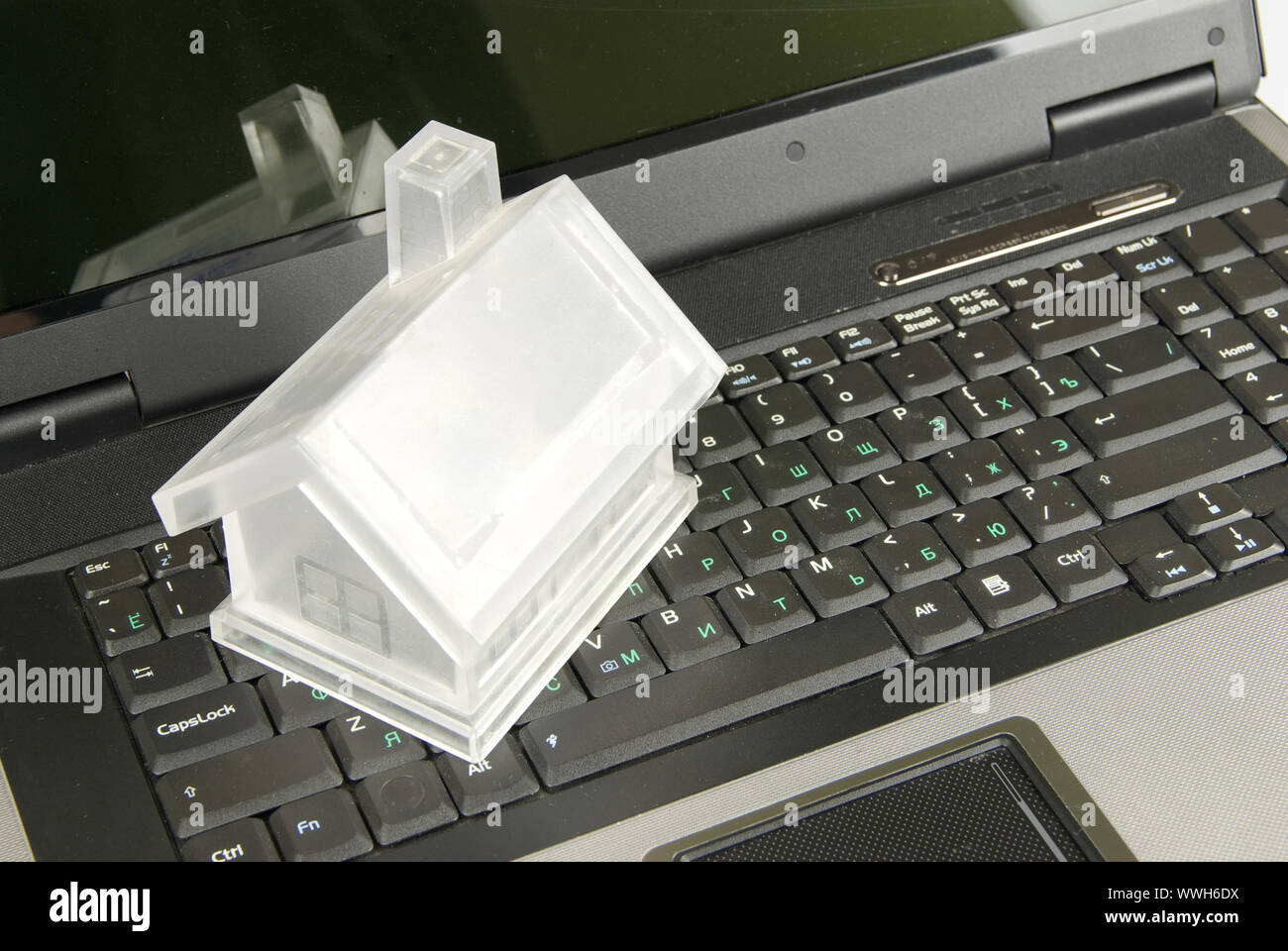 house isolated on laptop keyboard Stock Photo - Alamy