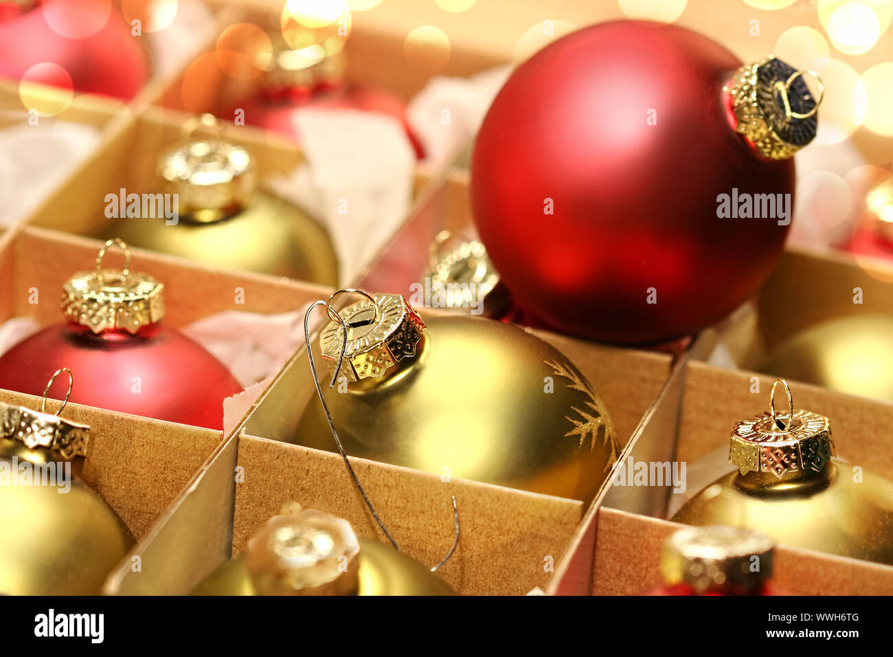 Collection of Christmas balls in box with wrapping Stock Photo - Alamy