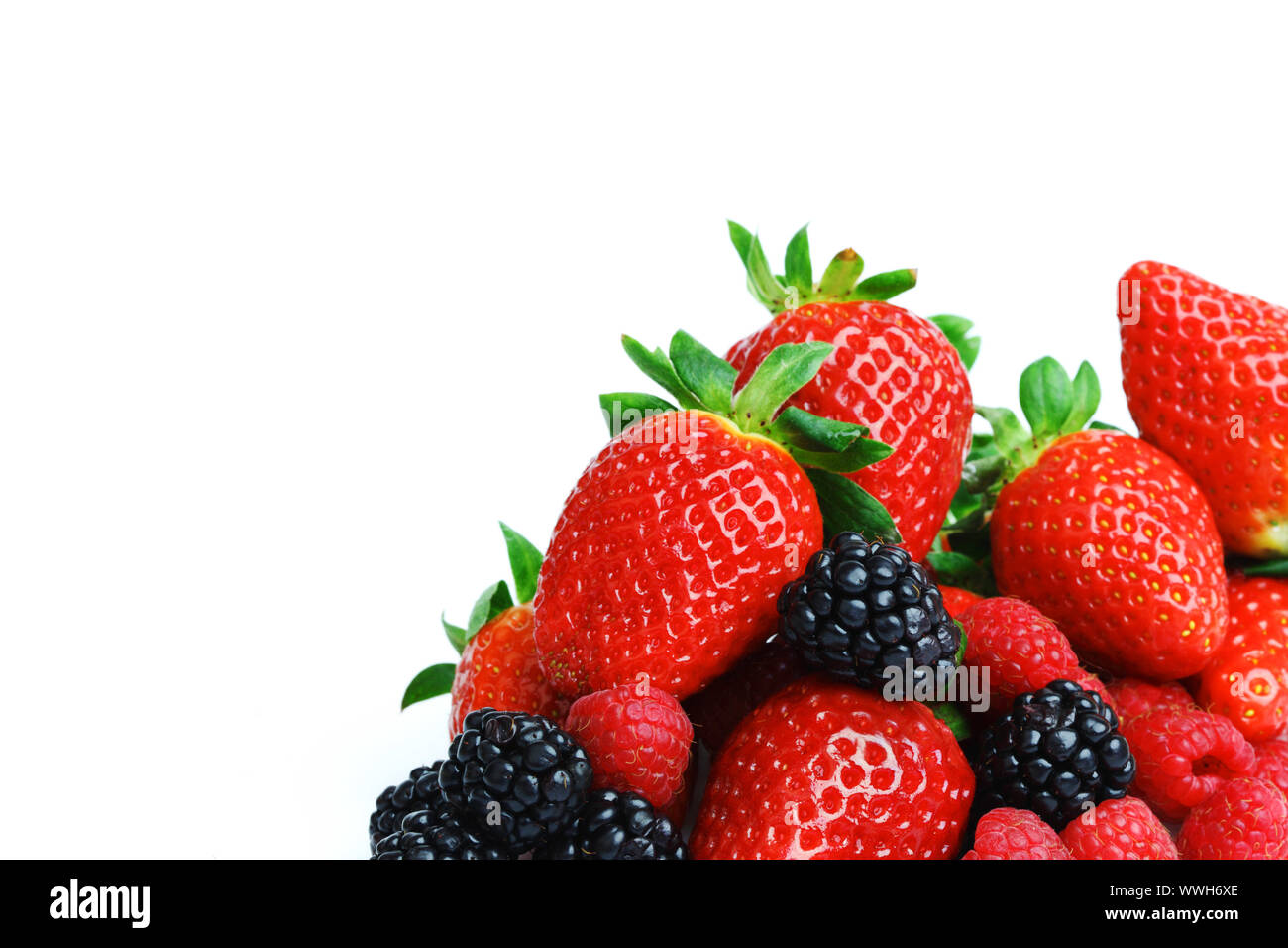 big berry pile isolated on white Stock Photo - Alamy