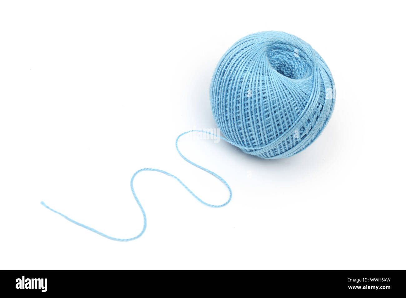 blue thread isolated on white background Stock Photo - Alamy