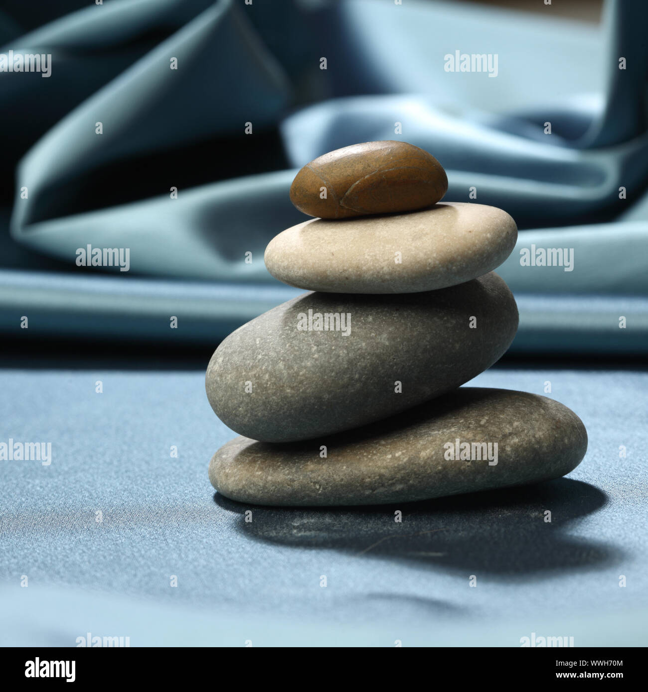 spa rock on ripled background Stock Photo - Alamy