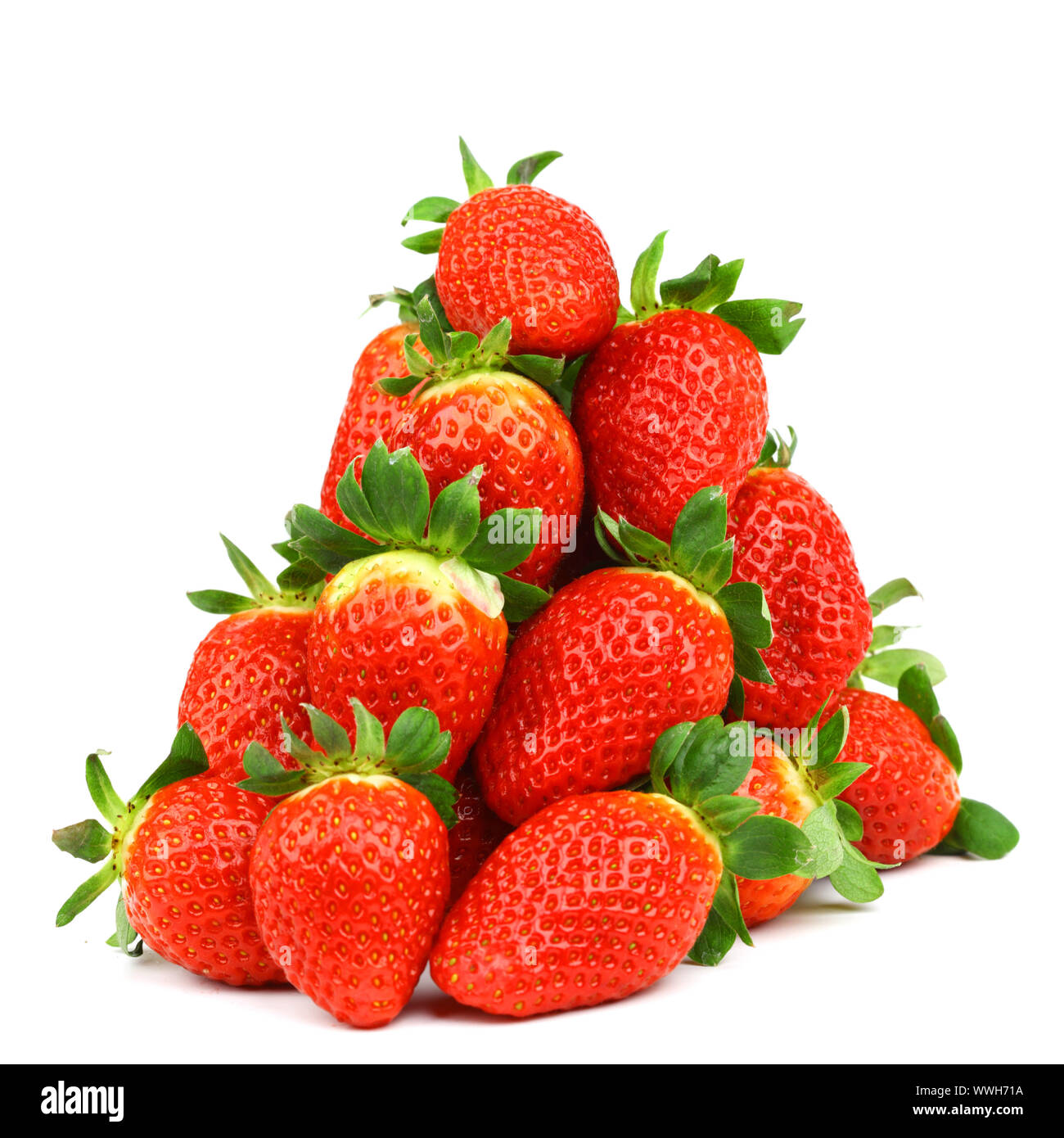 strawberry pile isolated on white background Stock Photo - Alamy