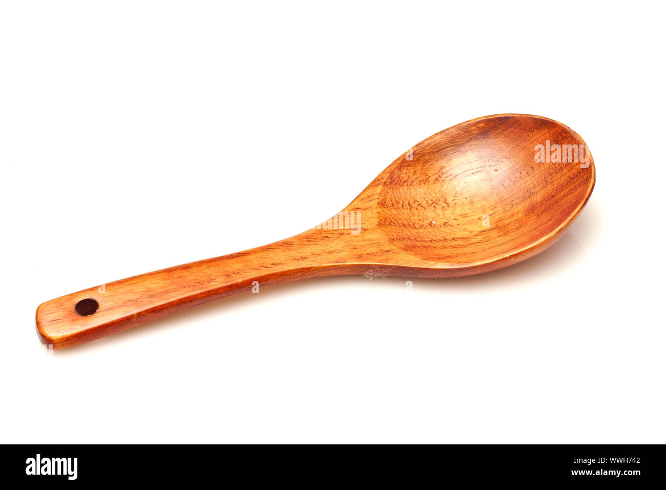 Wooden spoon isolated on white background Stock Photo - Alamy