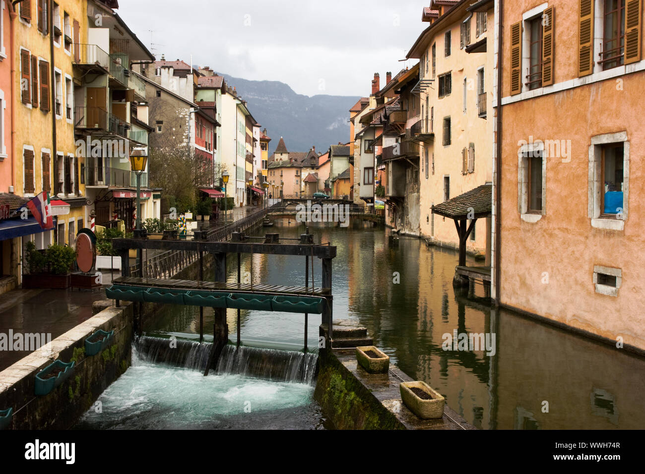 Canal with sluice gate at medieval town of Annecy, France Stock Photo ...