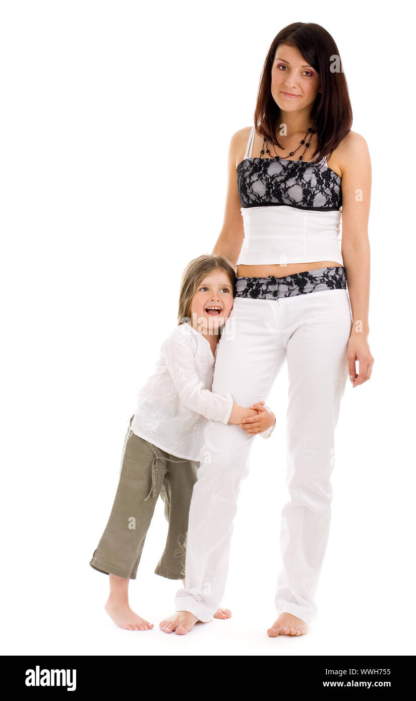 Young happy mother and daughter standing together Stock Photo - Alamy