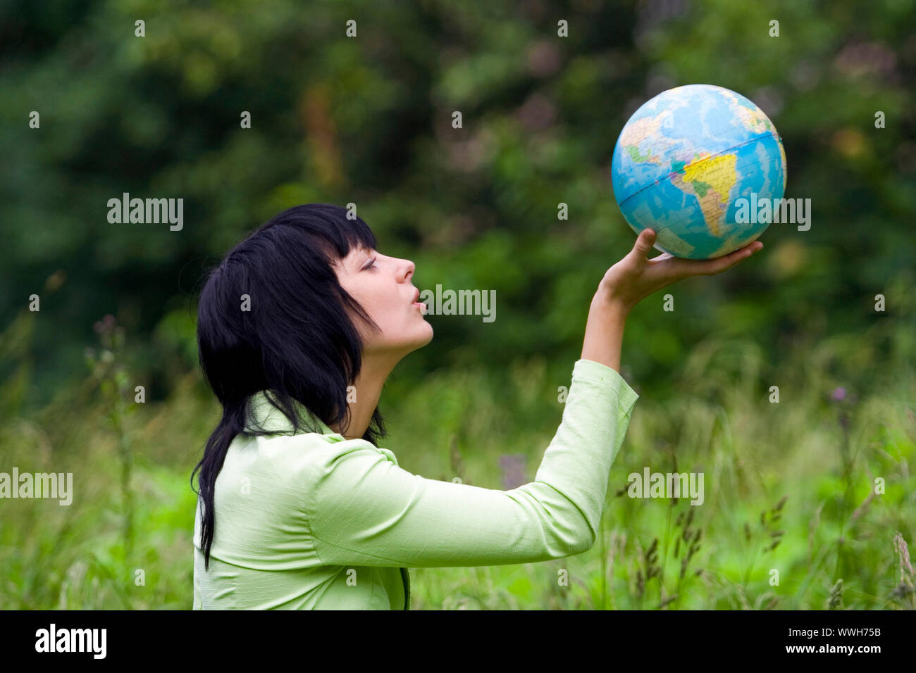 woman with global Stock Photo - Alamy