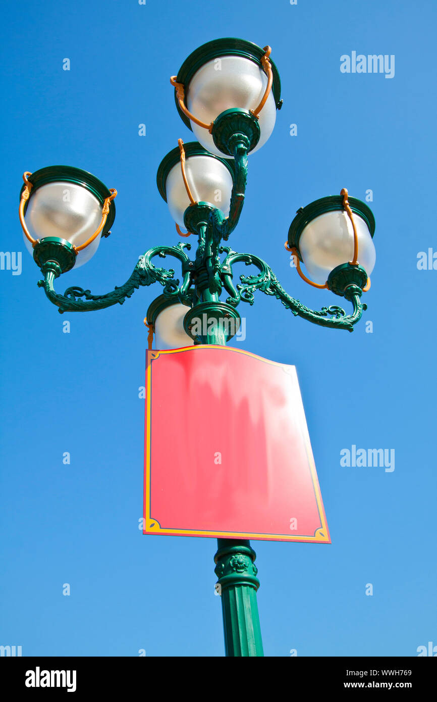 Lamp post and blue tree hi-res stock photography and images - Alamy