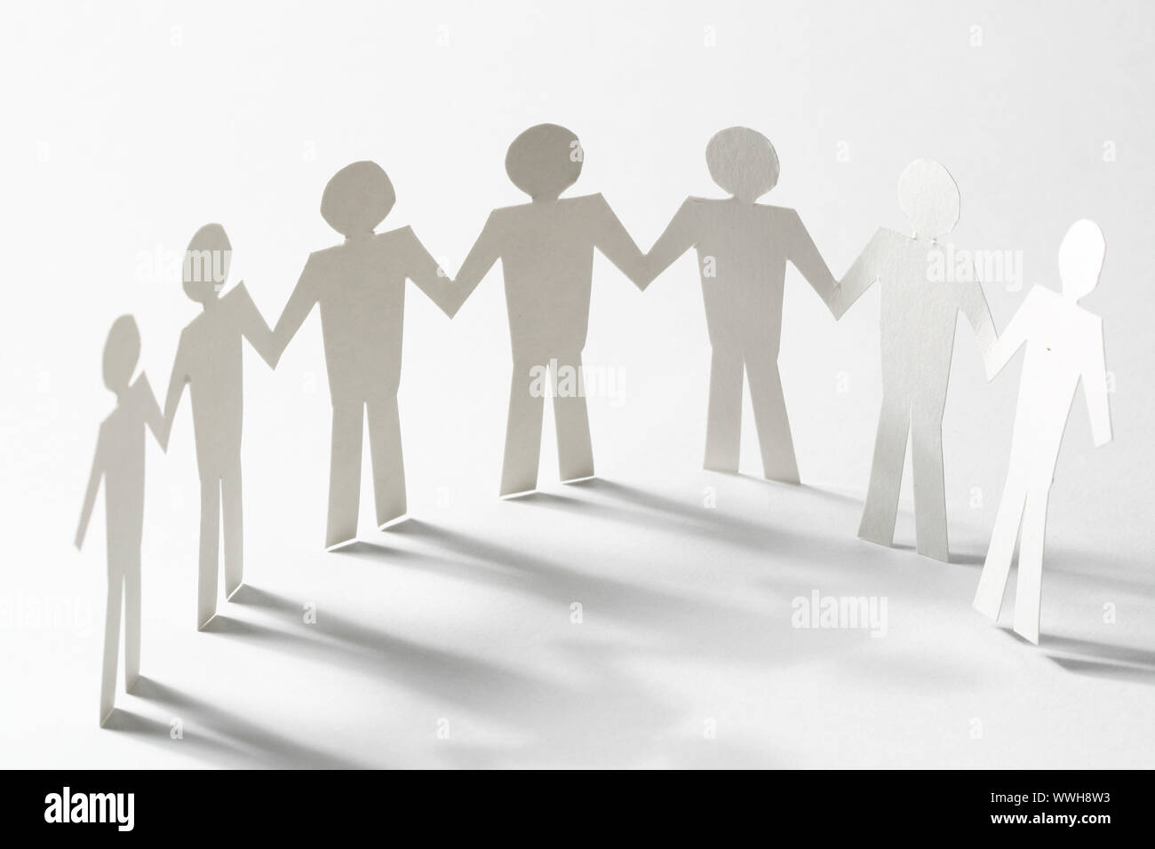 Teamwork concept human paper doll hi-res stock photography and images ...