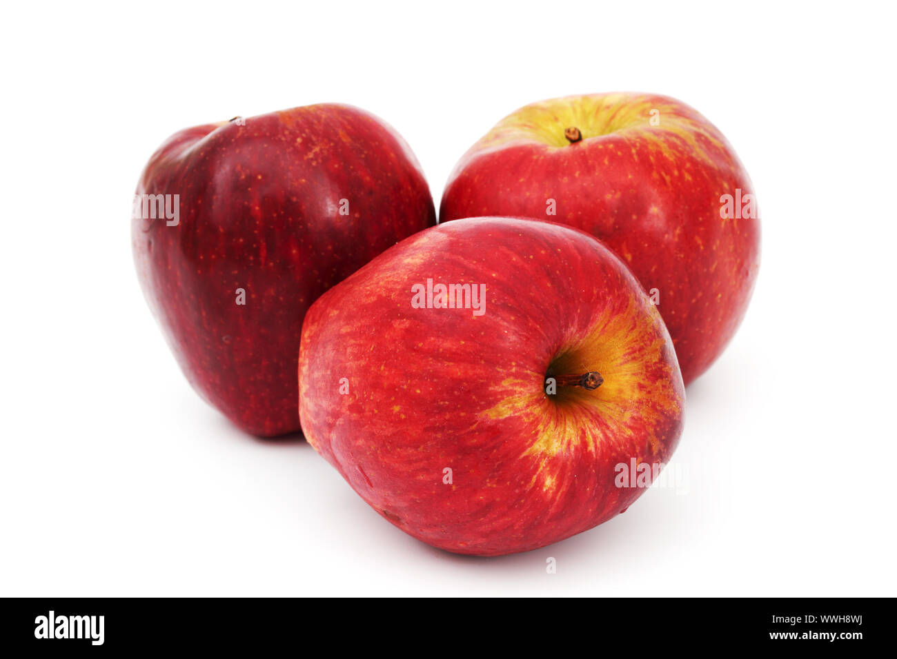 red apples pile isolated on white Stock Photo - Alamy