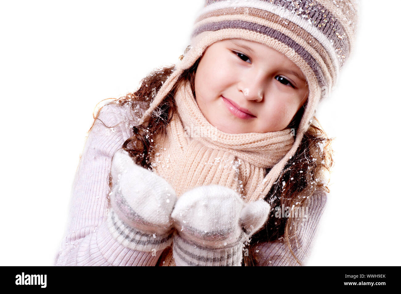 Winter Pleasant Girl in Cap and gloves Stock Photo - Alamy