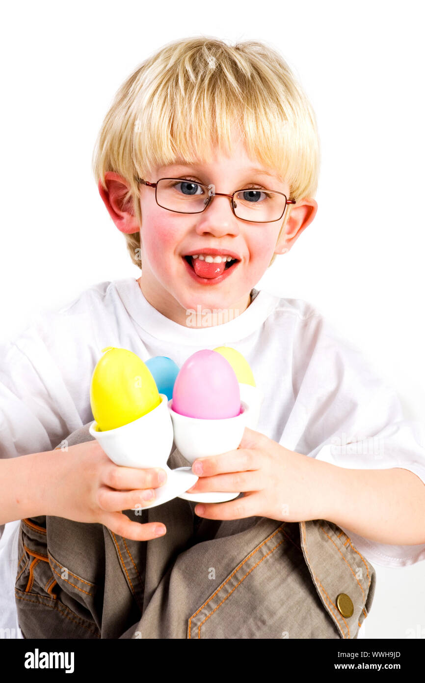 Little boy is having fun with easter eggs Stock Photo - Alamy