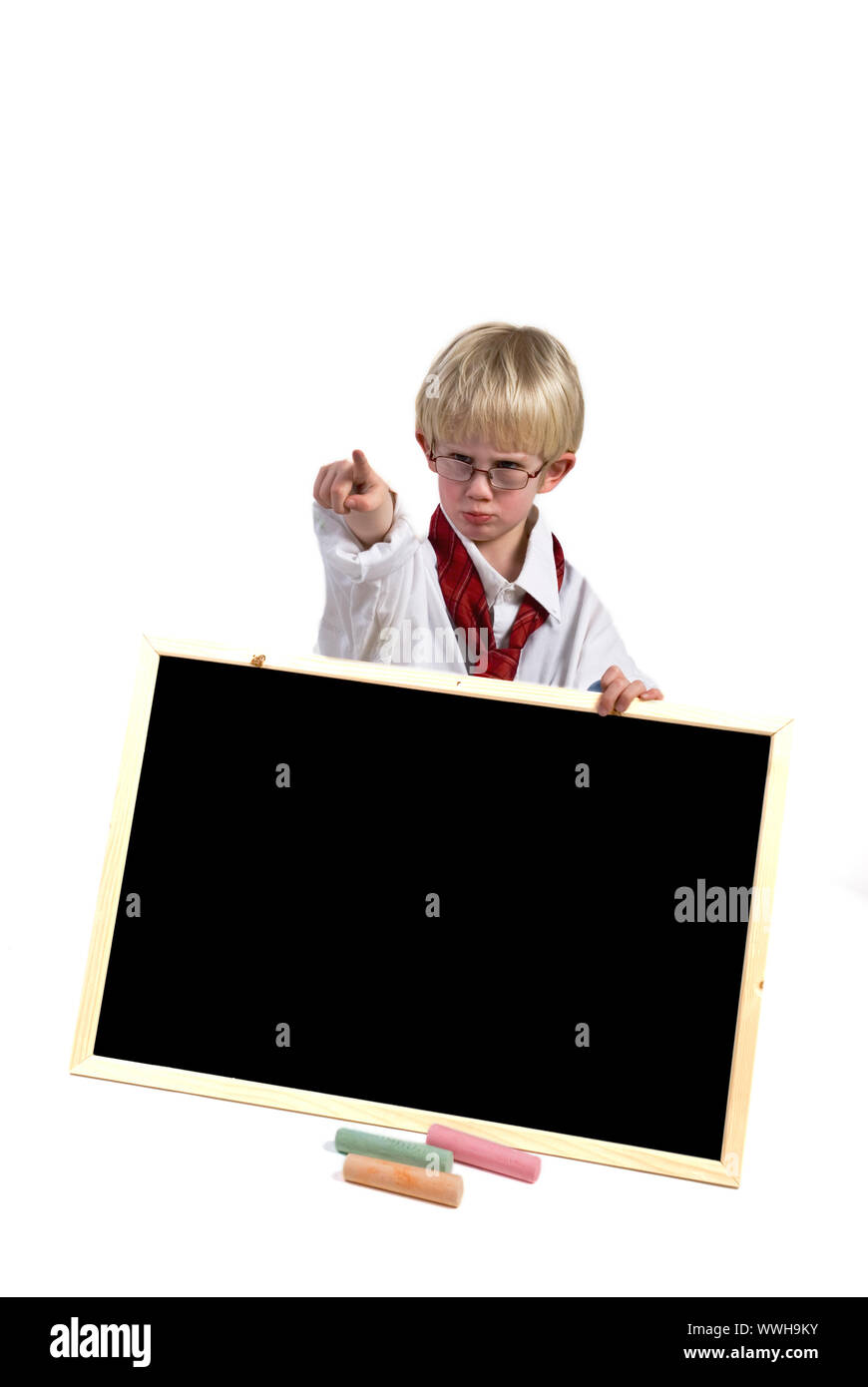 Angry kid with black-board to write your message on Stock Photo - Alamy