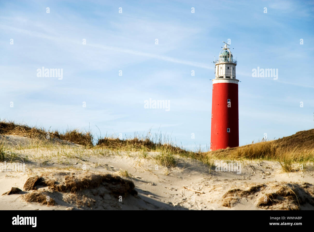 red classic lighthouse at the beach Stock Photo - Alamy
