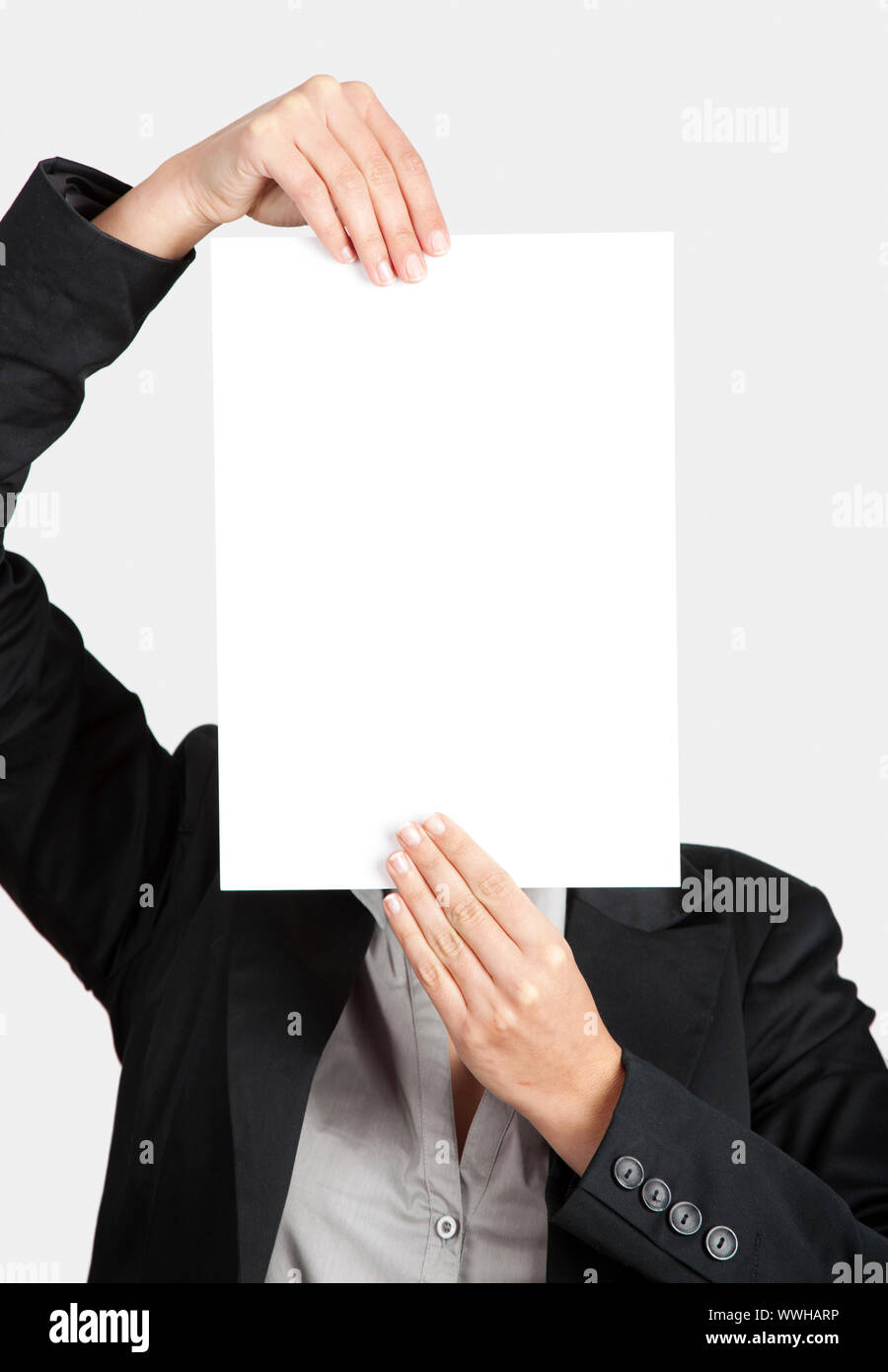 Woman showing a blank paper sheet in front of her head Stock Photo - Alamy