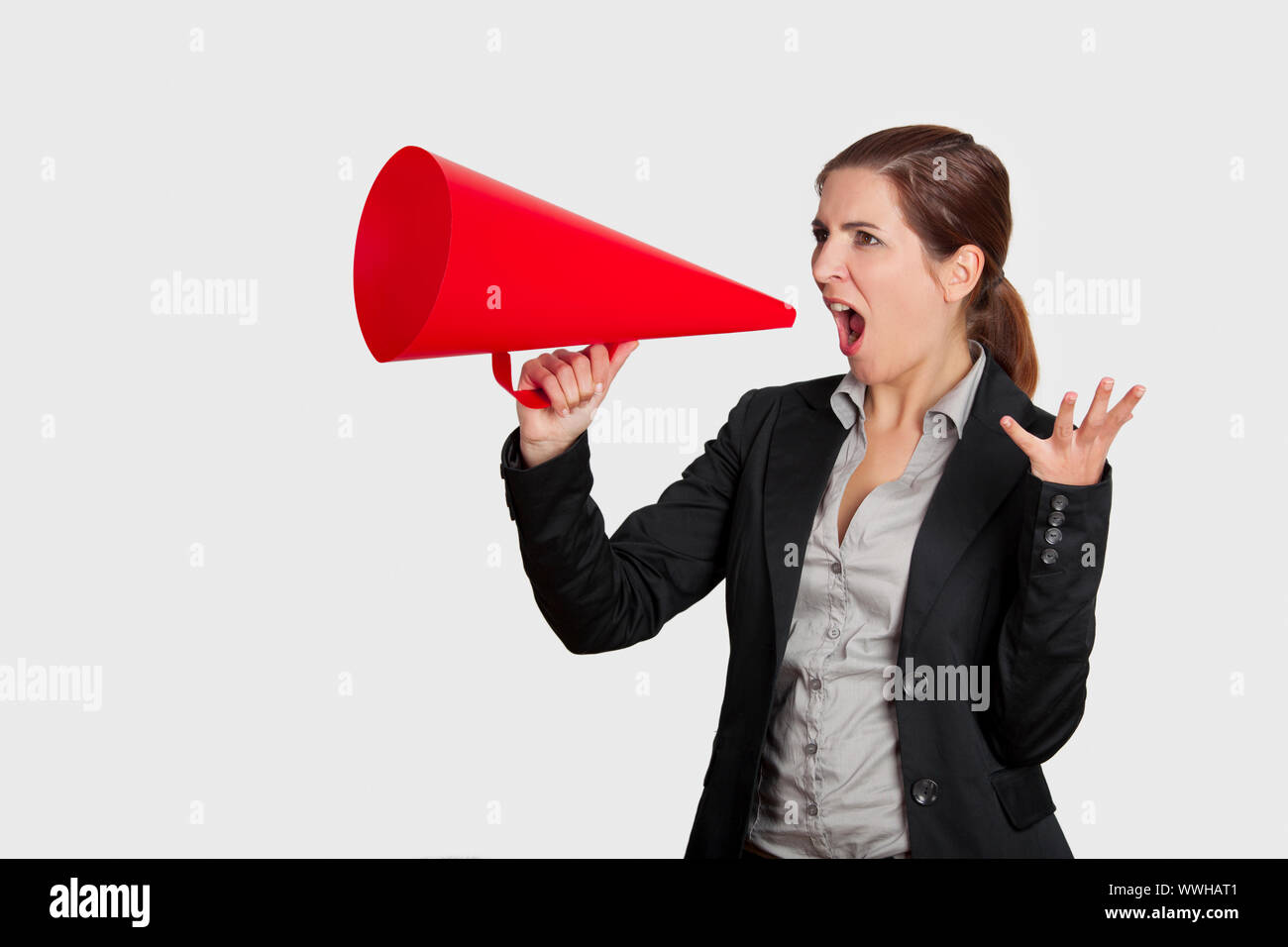Business young woman speaking to a megaphone, isolated on white Stock ...