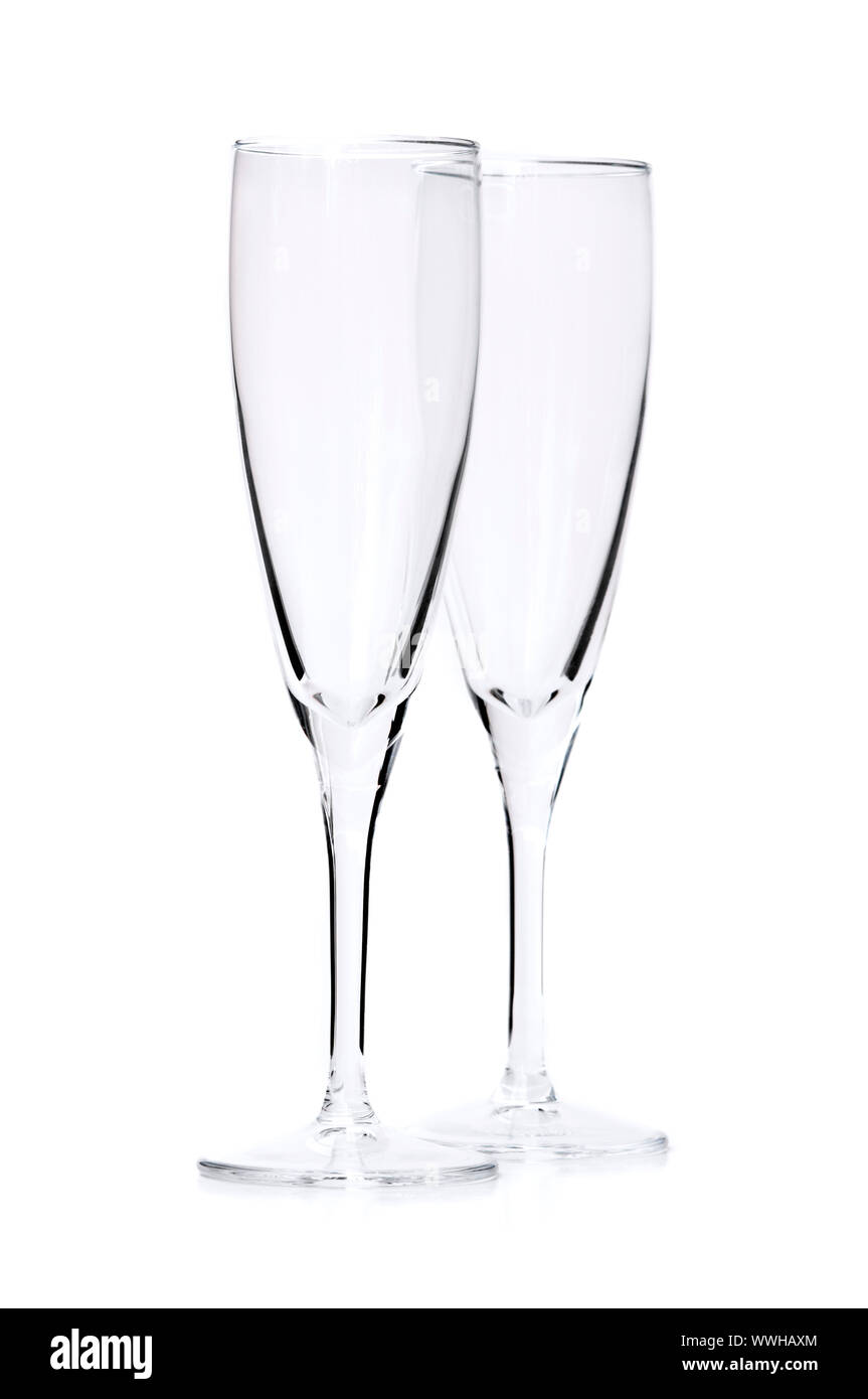 Two empty champagne flutes isolated on white background Stock Photo - Alamy