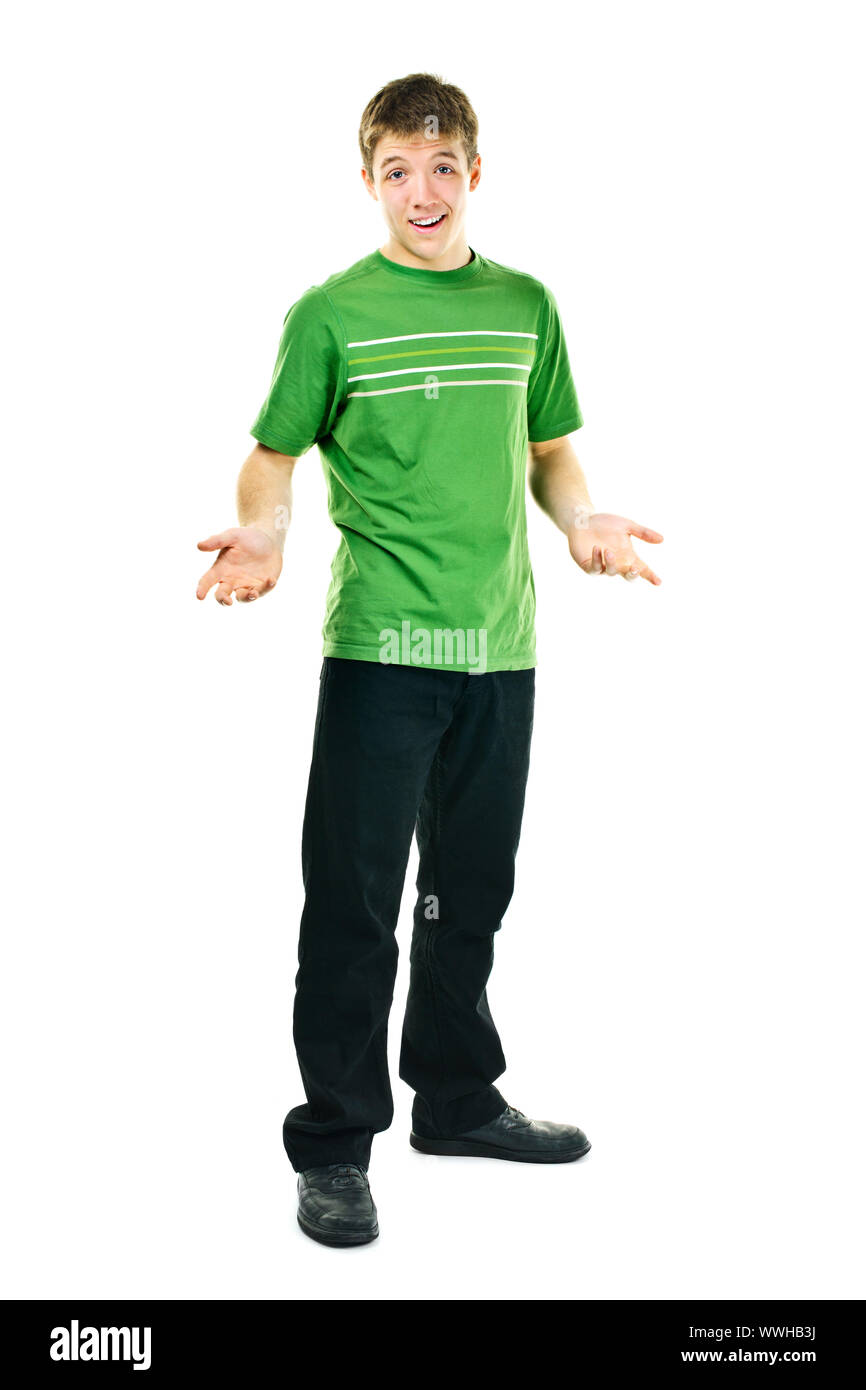 Shrugging young man standing isolated on white background Stock Photo ...