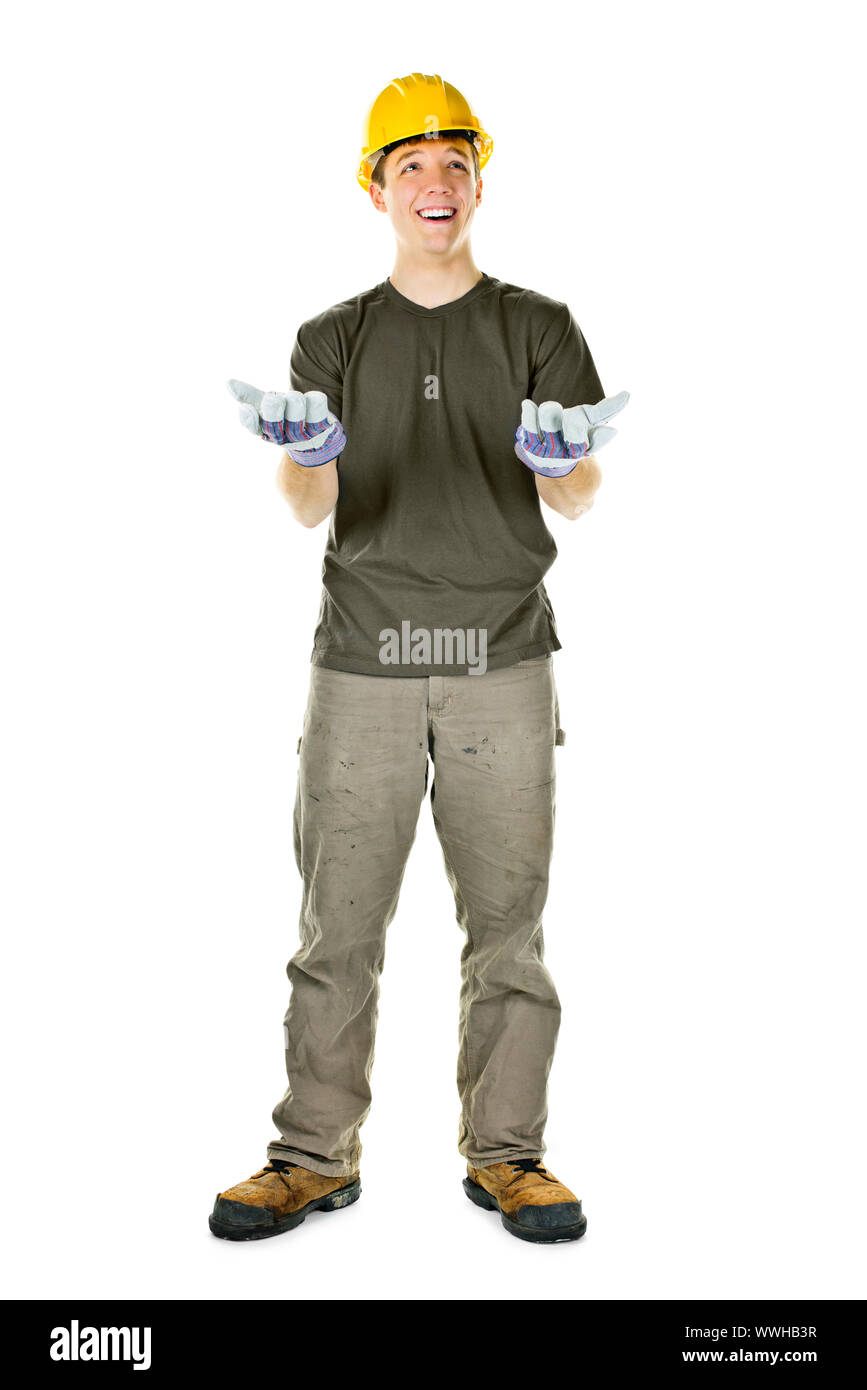 Young construction worker looking up shrugging isolated on white ...