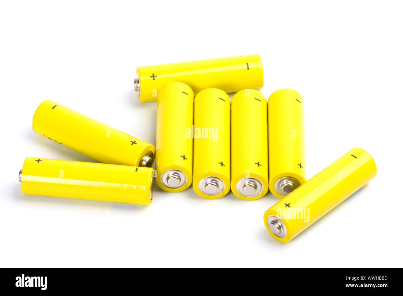 eight yellow alkaline batteries isolated on white backgroun Stock Photo ...